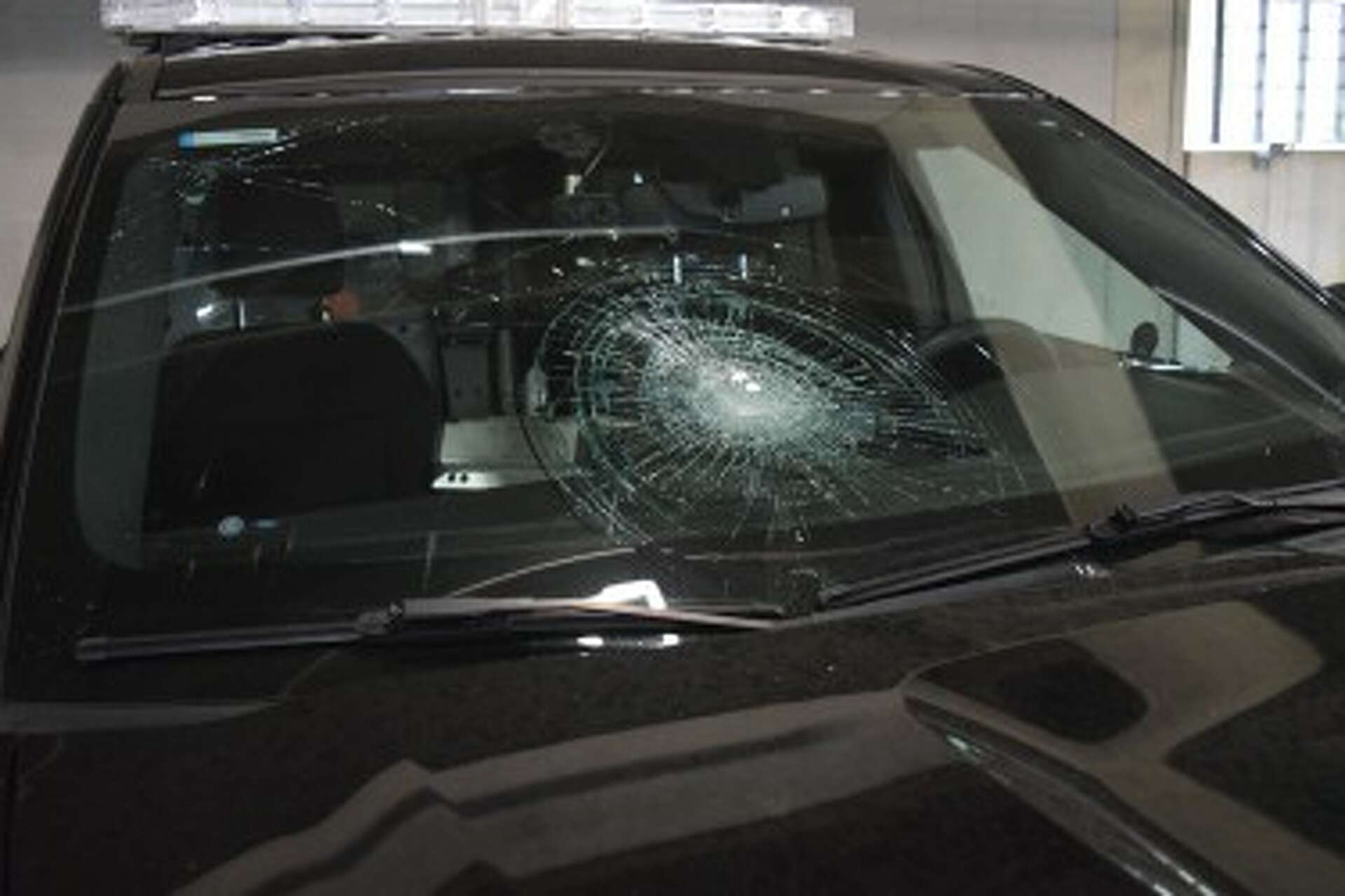 Video of Ansonia street takeover shows group confront cop, damage car