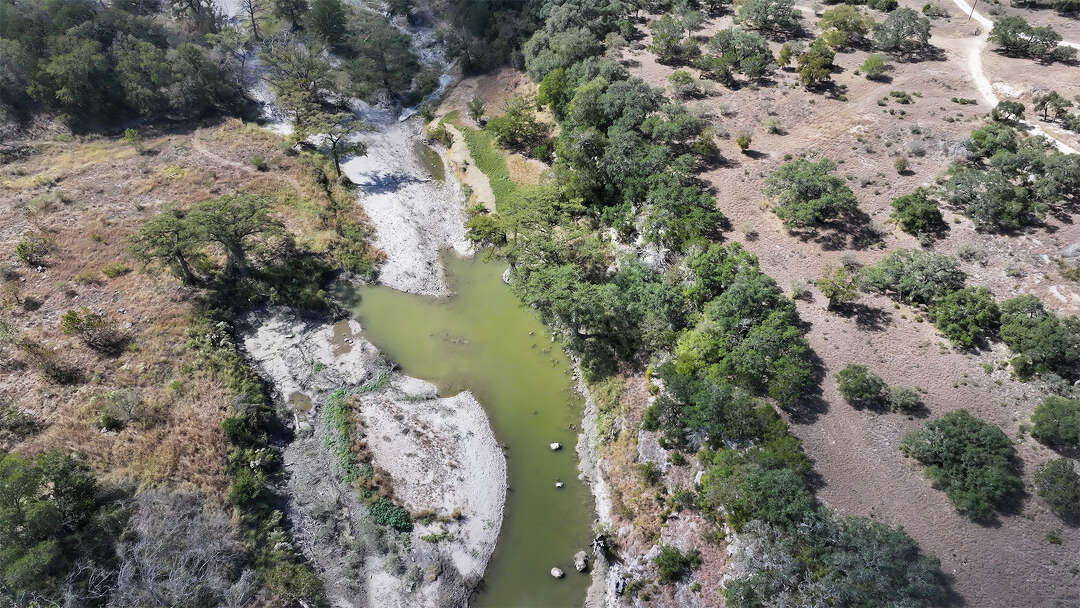Canyon Lake is at a record low. Why is it still releasing water?