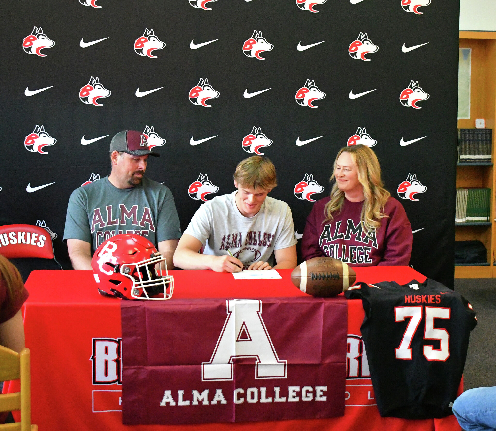 Grayson Converse signs with Alma College to play football