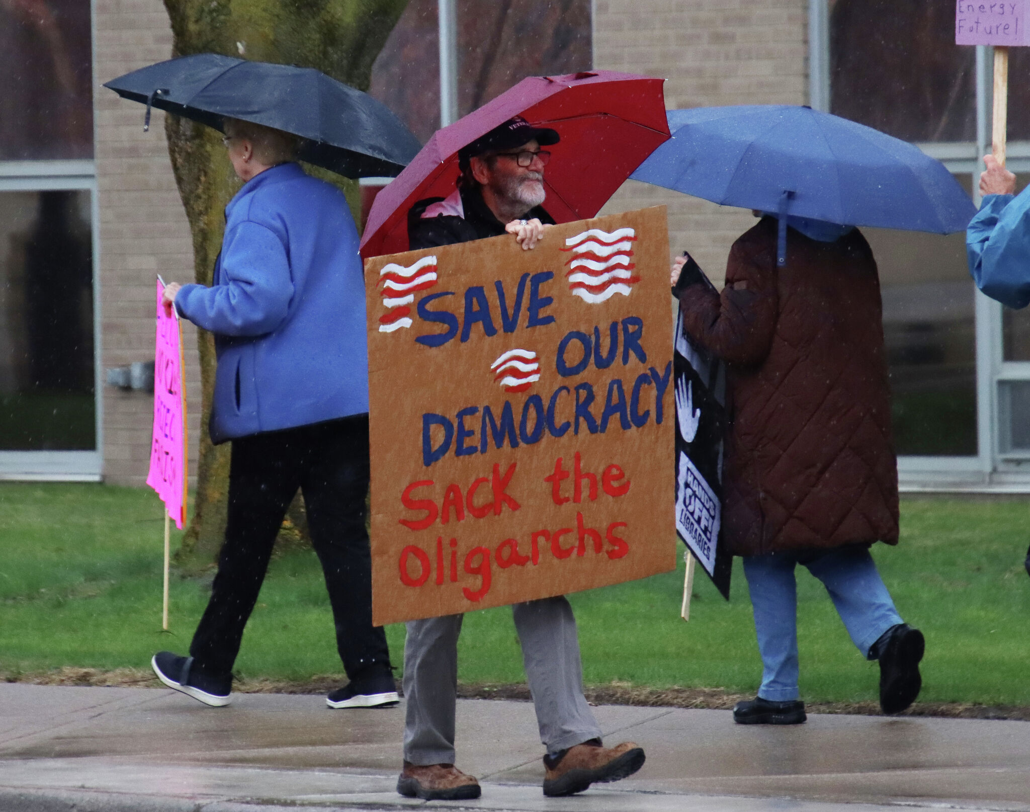 Protestors march in rain for Bad Axe May Day demonstration