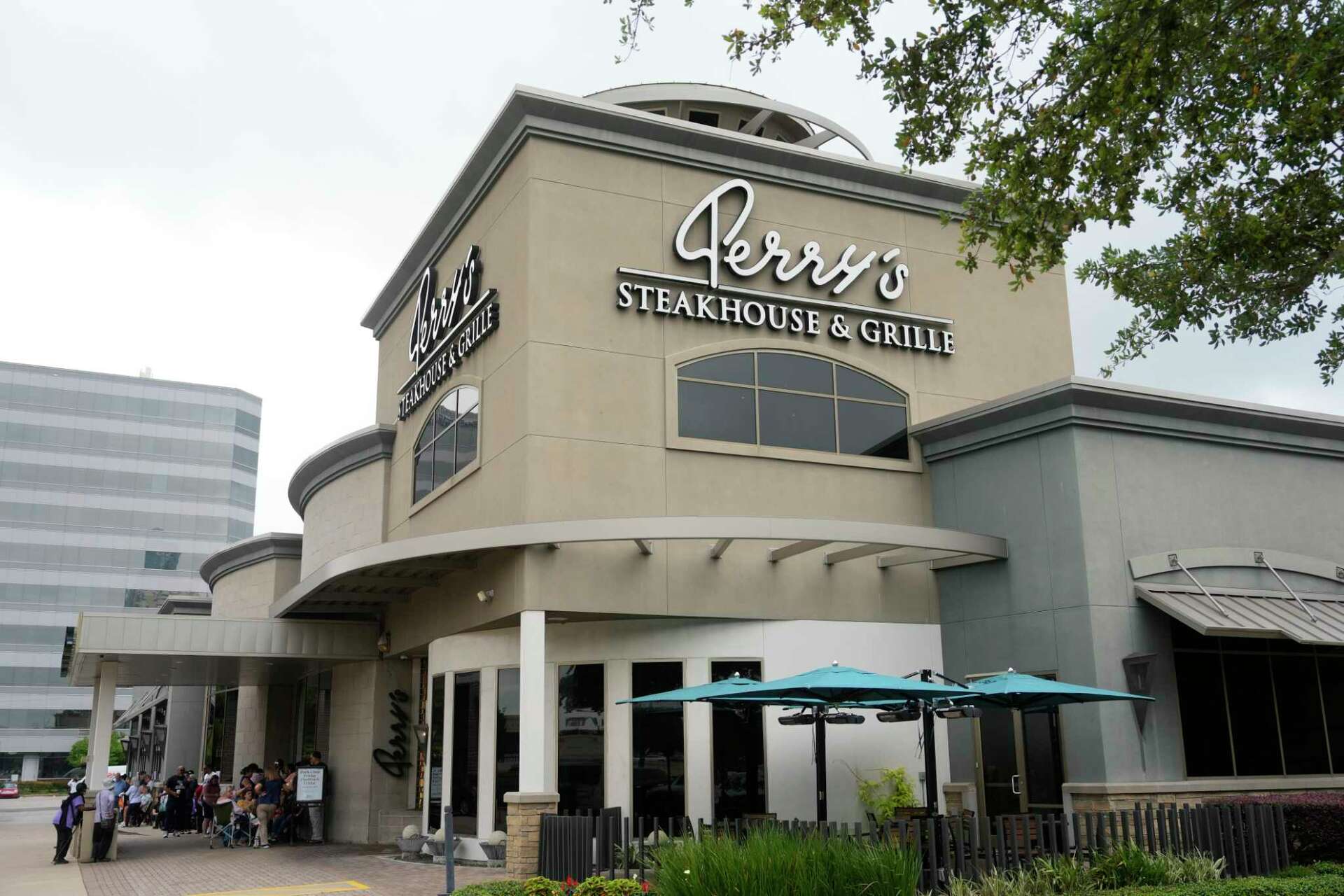 Perry's Steakhouse patrons line up early for 79-cent pork chop Friday