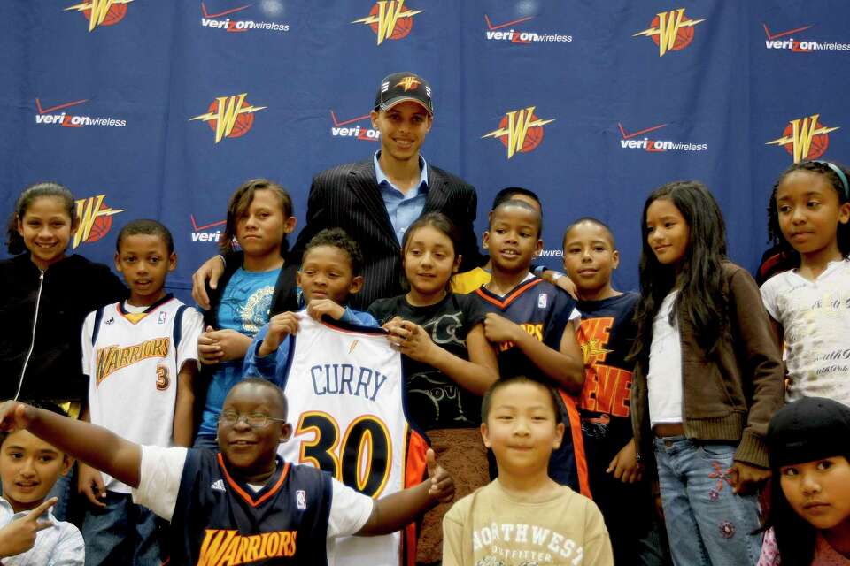 Photos of Steph Curry when he was a baby-faced Warriors rookie
