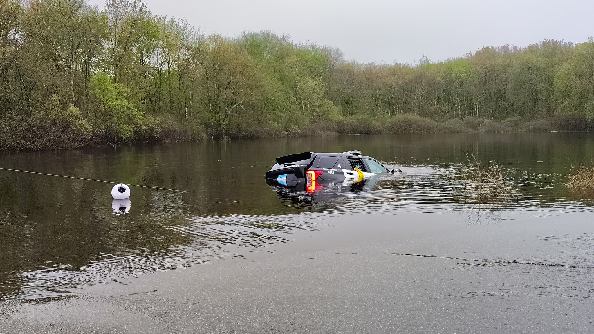 Wolcott police car gets caught in flooded pond, but officer OK: Chief