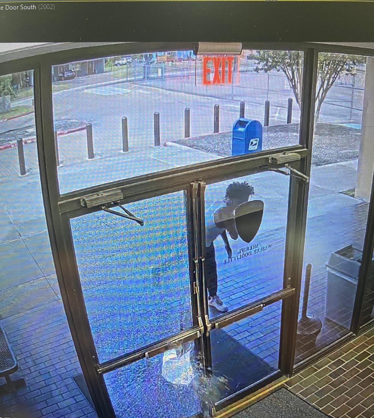 Conroe man accused of throwing rock through sheriff's office door