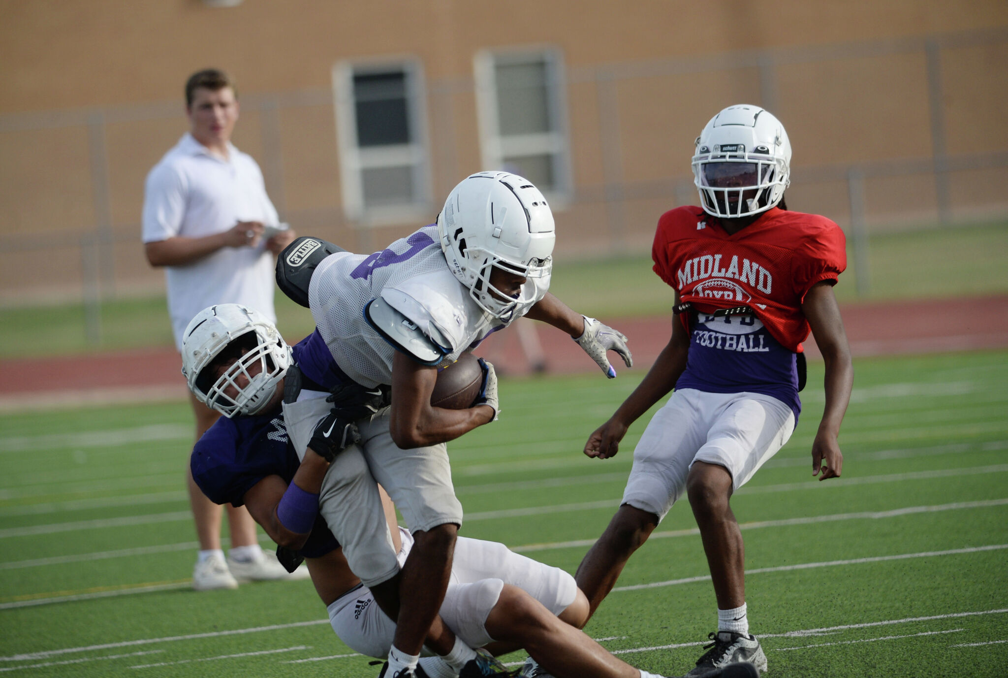 Defense shines in Midland High spring football game