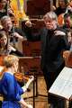 Understanding the vital role of a conductor in orchestra performances
