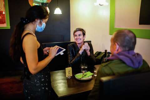 A federal "no tax on tips" policy is dividing restaurants.