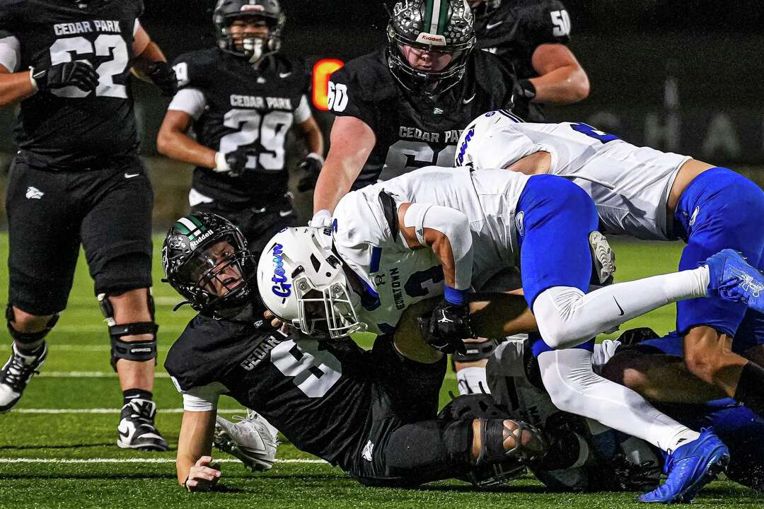 Texas high school football coach Sam Robinson steps down