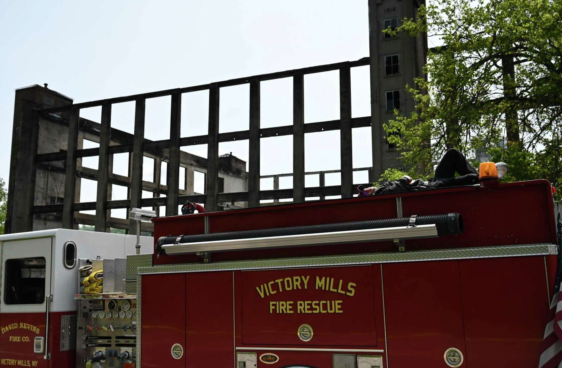 Photos: Smoking shell left after Victory Mills fire
