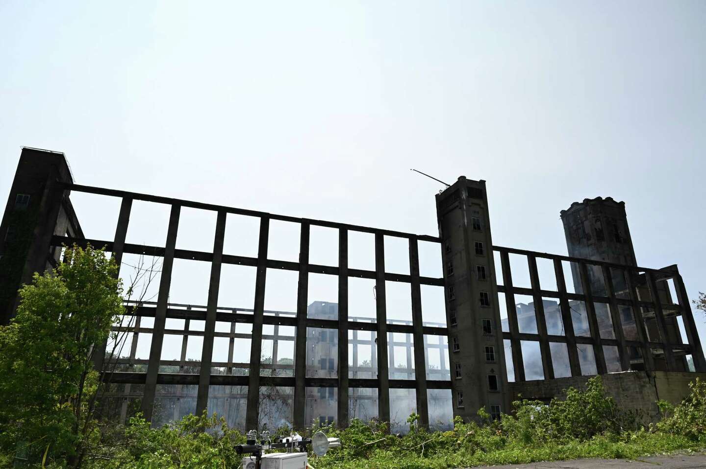 Photos: Smoking shell left after Victory Mills fire