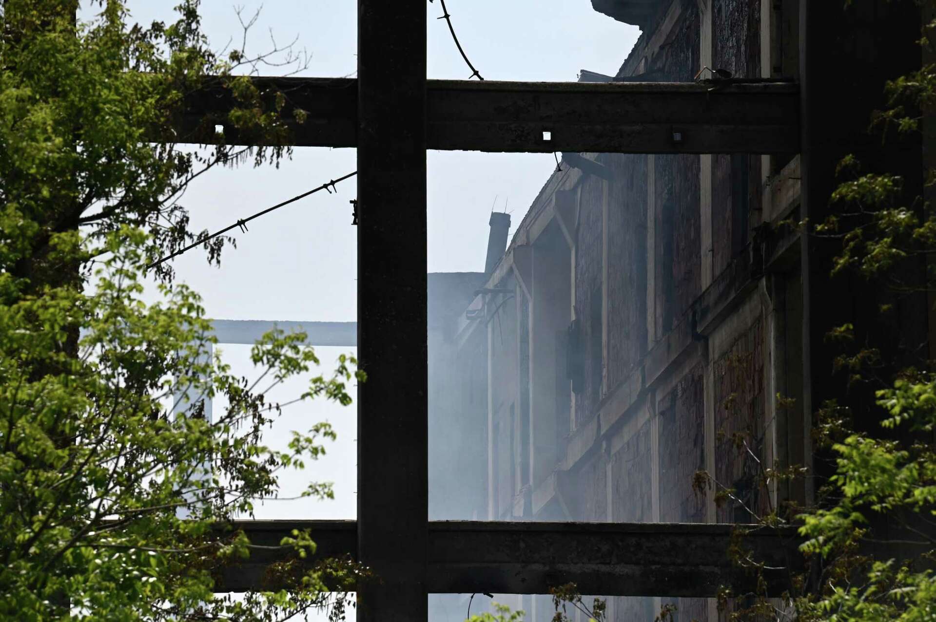 Photos: Smoking shell left after Victory Mills fire