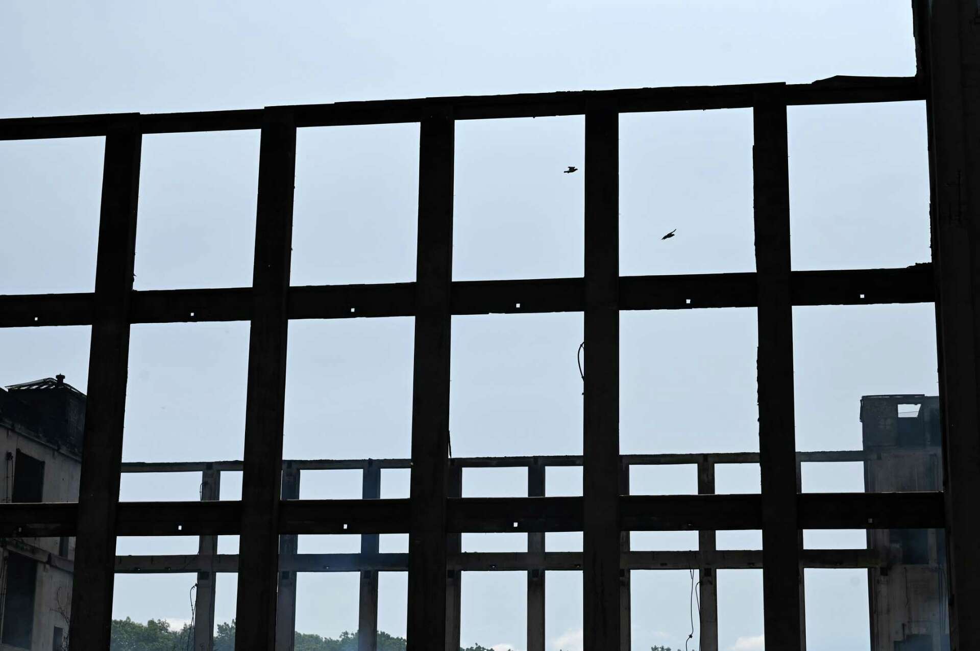 Photos: Smoking shell left after Victory Mills fire