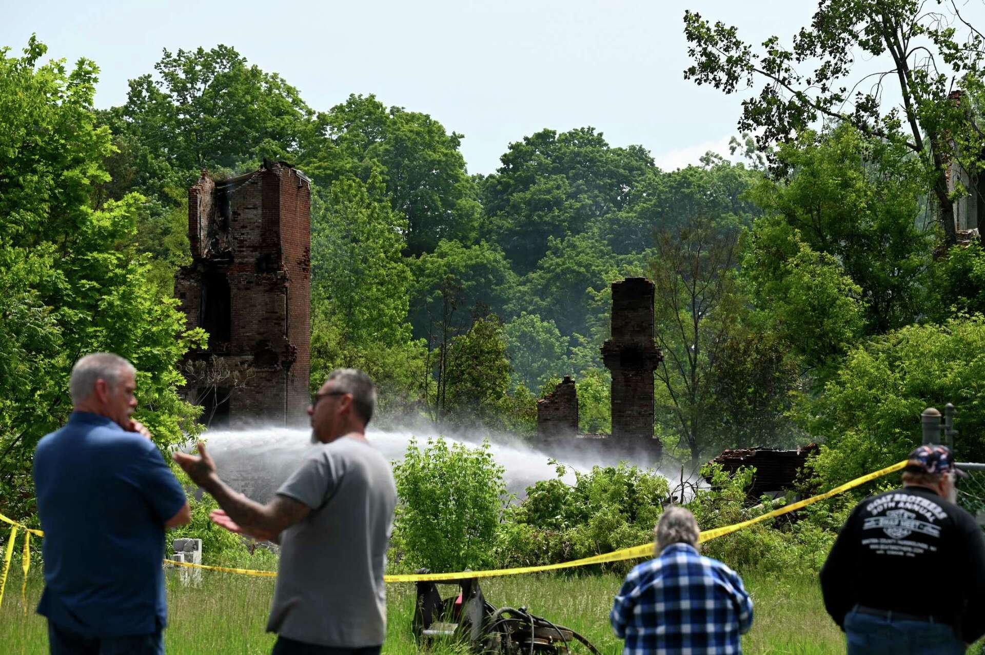 Photos: Smoking shell left after Victory Mills fire