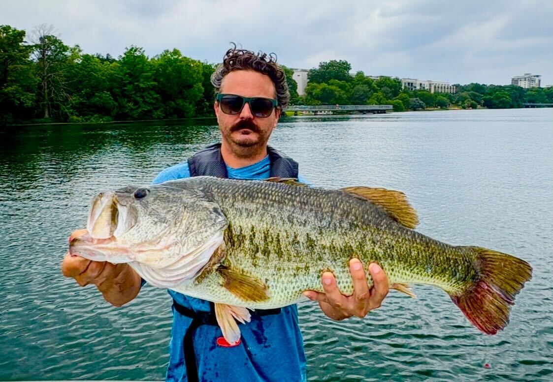 Normal-size man sets record for largest-size bass hooked at Texas Lake