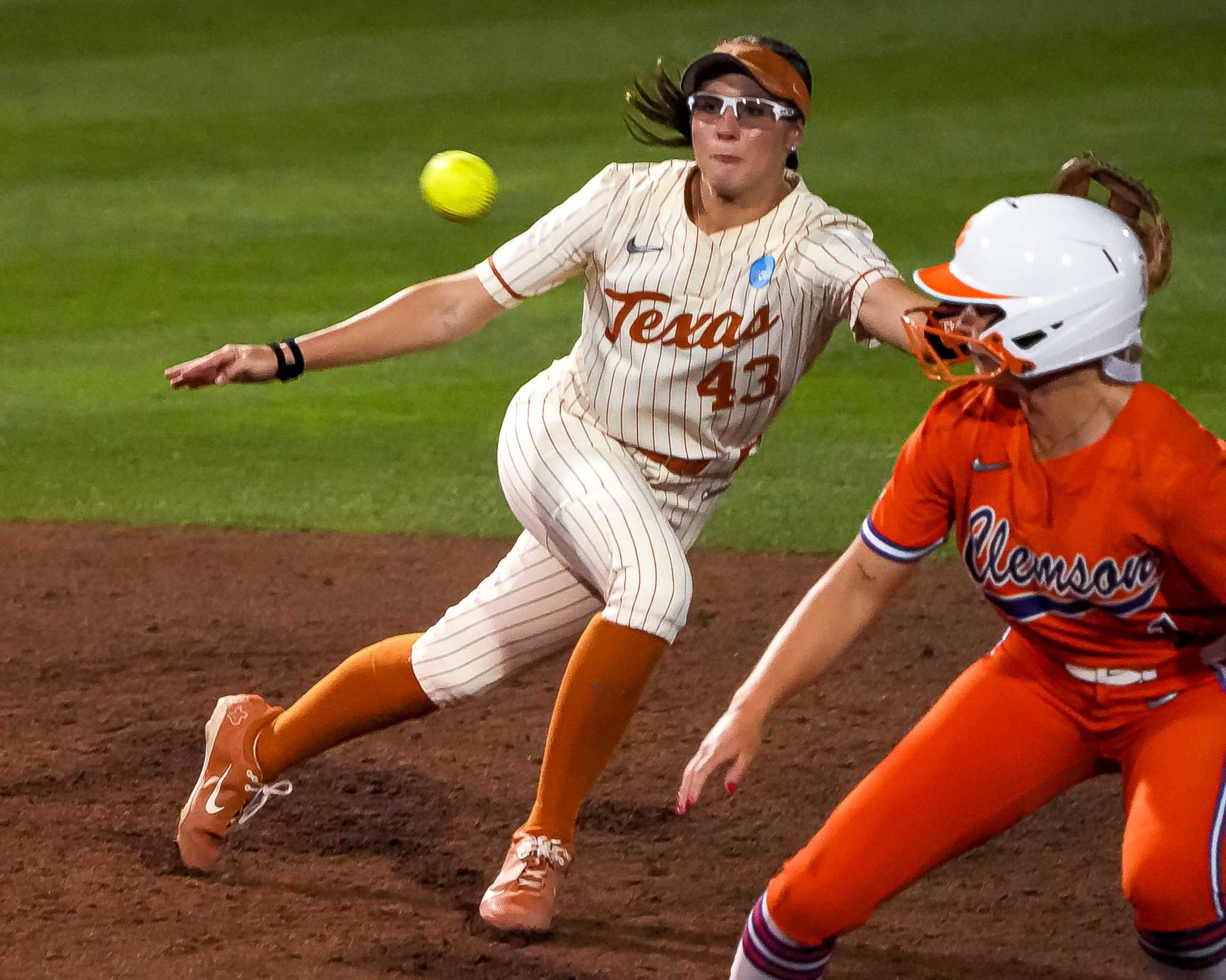 NCAA softball tournament: Texas alive, tops Clemson in extra innings