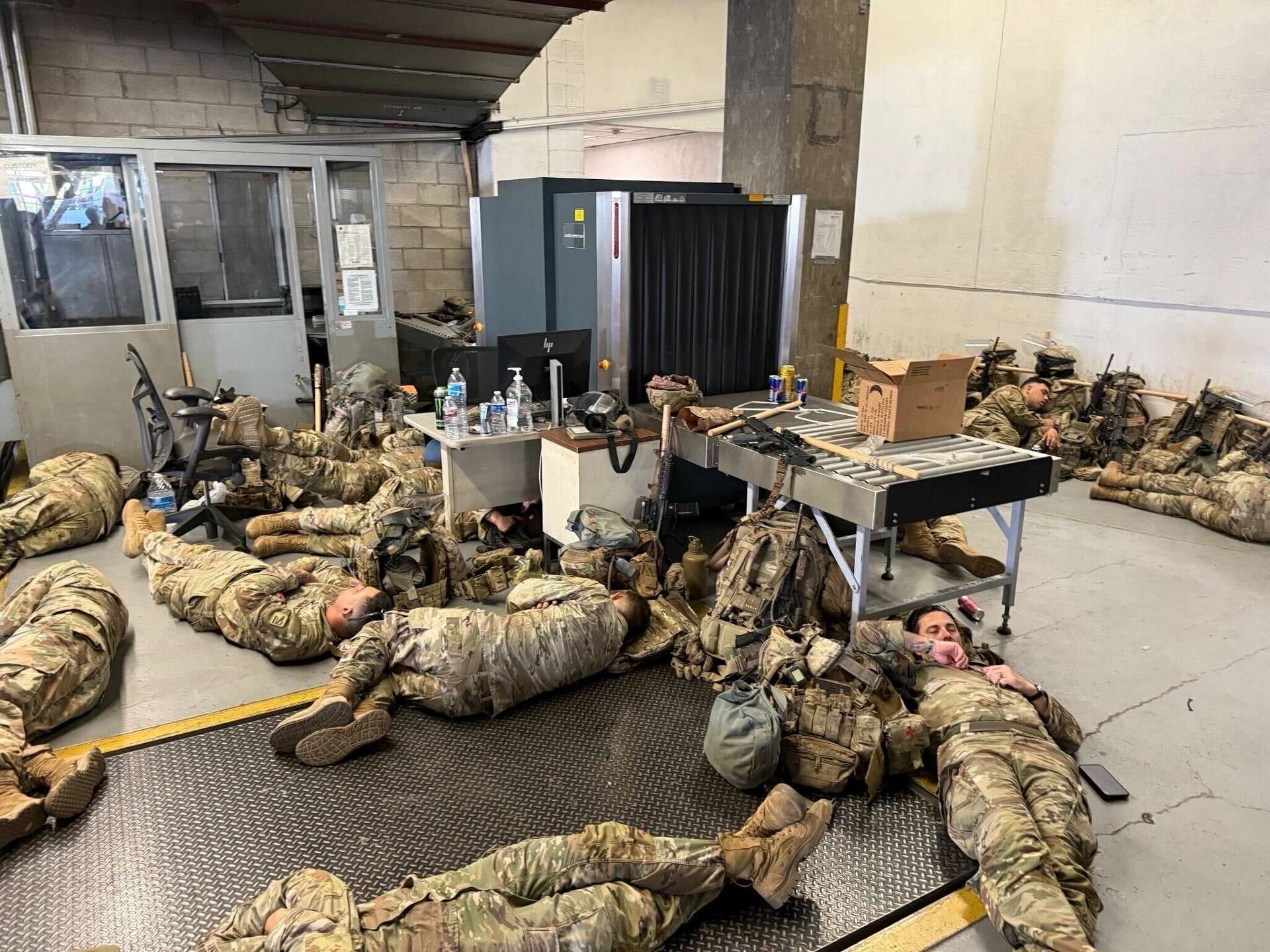 National Guard troops seen sleeping on floors in exclusive photos
