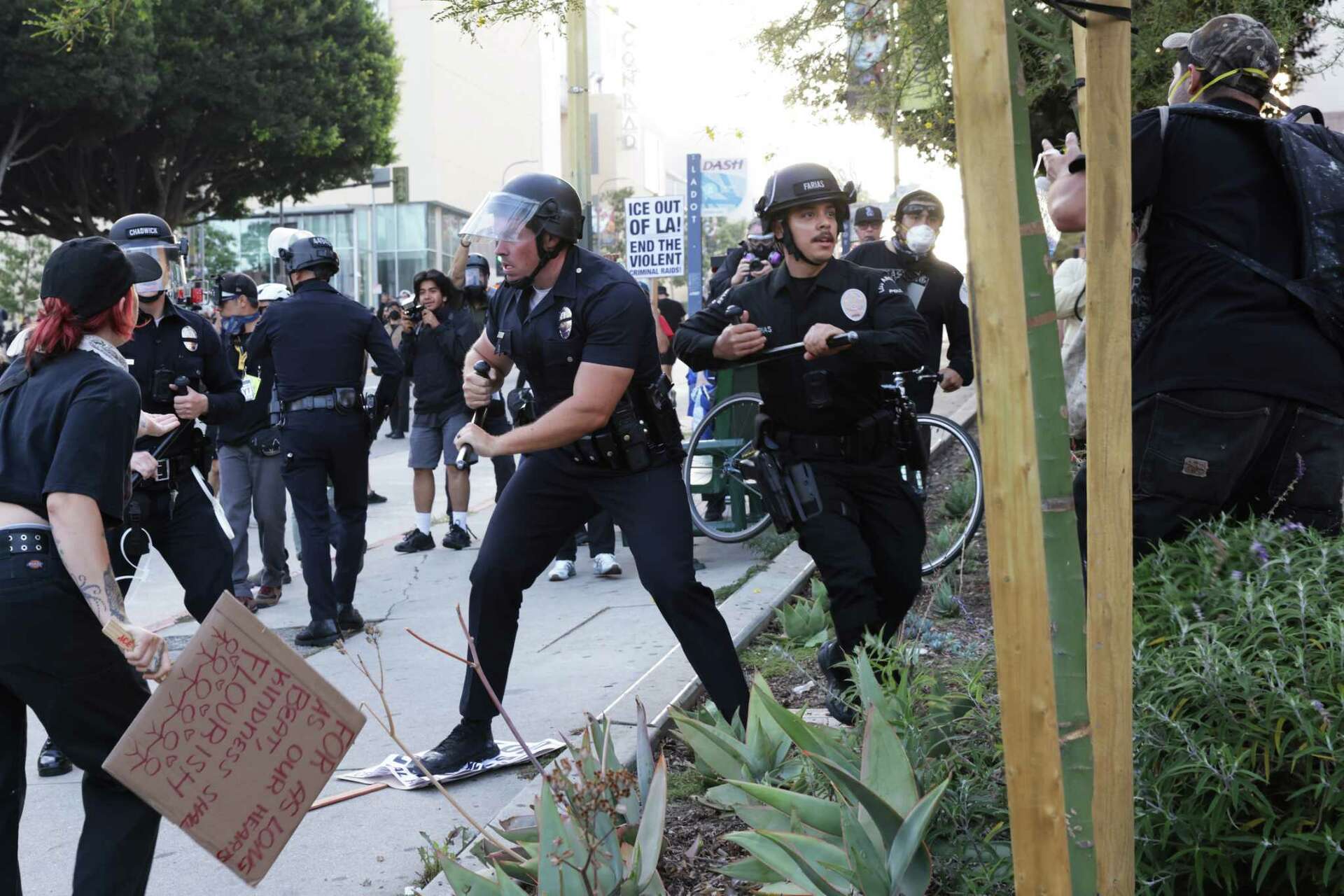 LAPD fires flash-bang grenades, less-lethal rounds at protesters