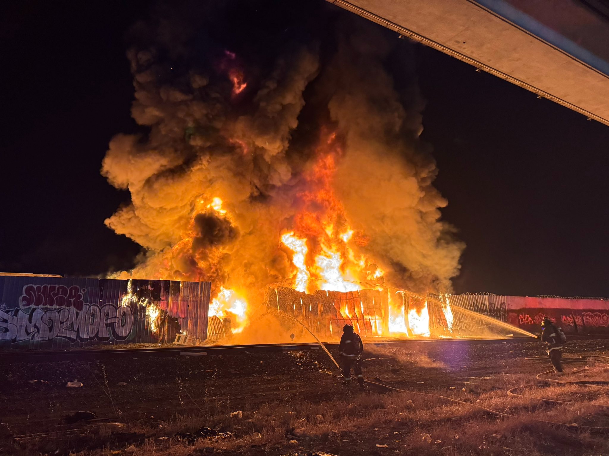 Late-night Oakland fire burns hundreds of portable toilets
