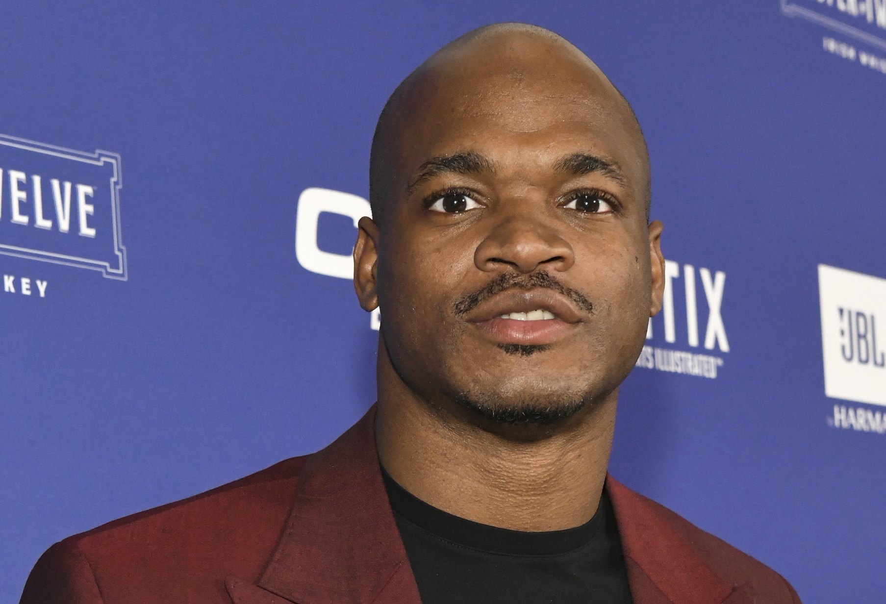 NFL star Adrian Peterson, Houston poker player take their beef to ring