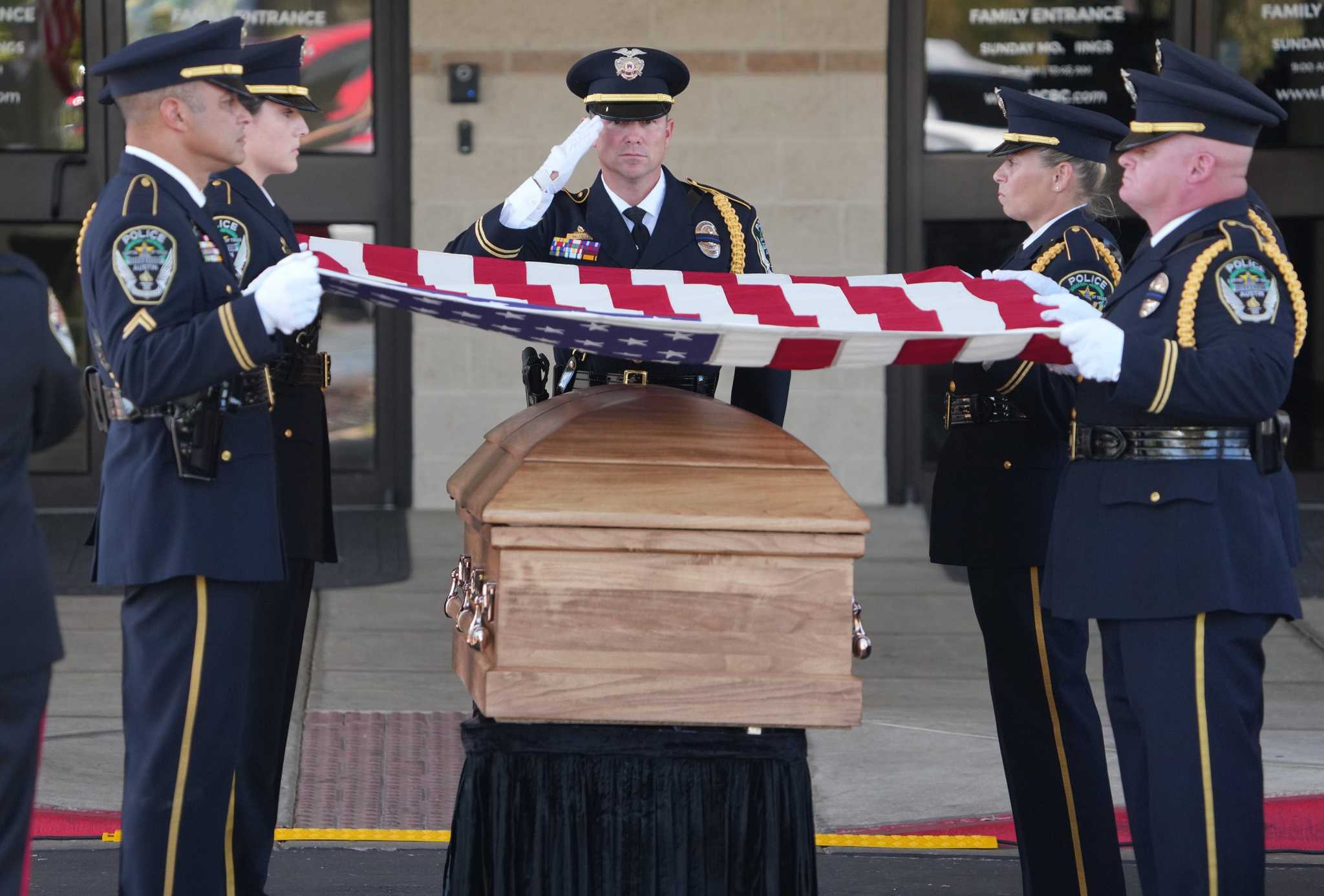 Hundreds mourn as fallen Austin officer given full honors at funeral