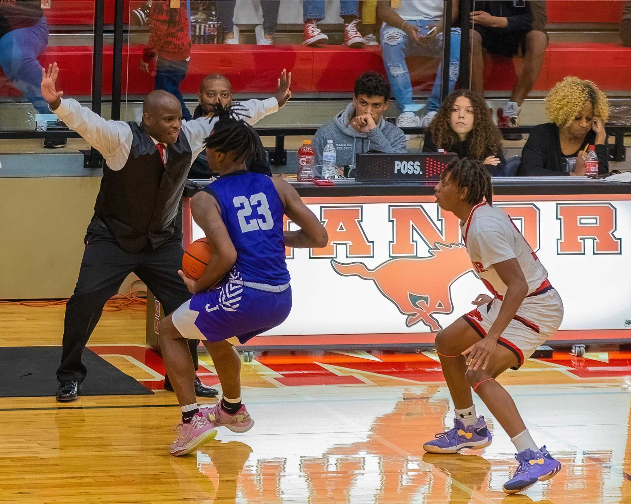 Manor boys basketball gets defensive in rivalry win over LBJ