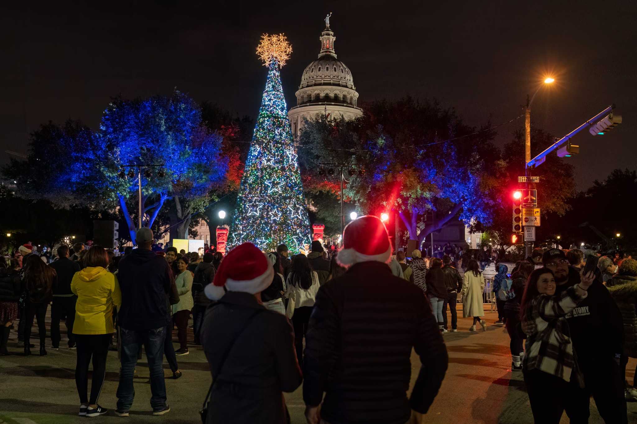 Photos of Texas Capitol Christmas tree and downtown holiday singalong