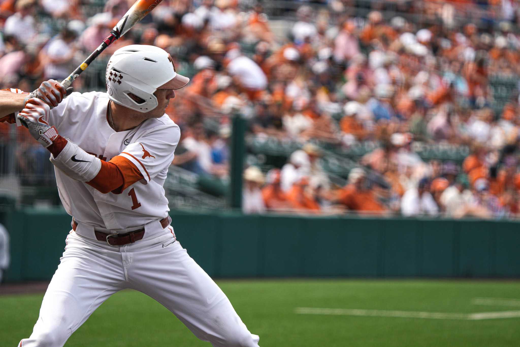 Texas beats Miami to claim regional title in NCAA baseball tournament
