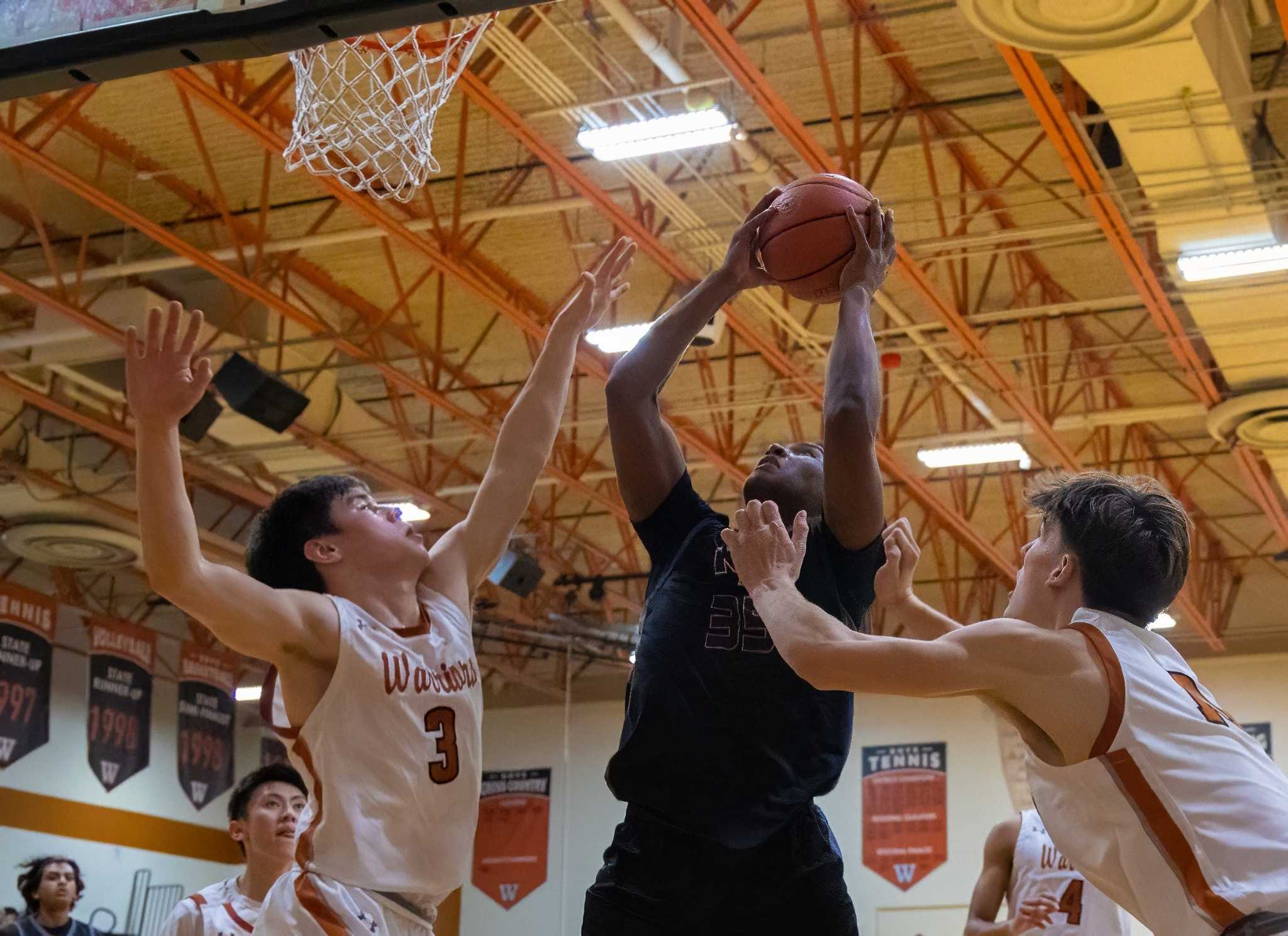 The Round Rock boys basketball team beat Westwood 57-40 in 25-6A game