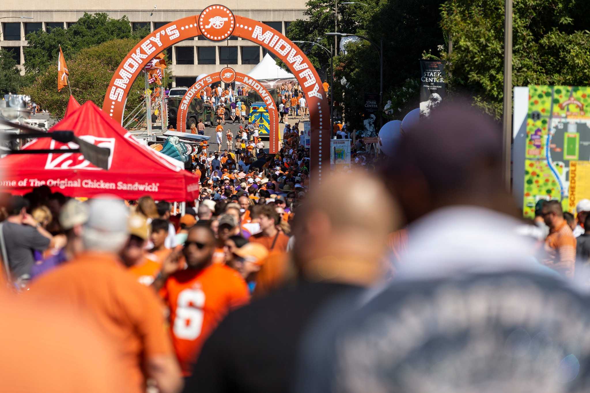 UT Austin tailgate setup adds food & beer trucks, free carnival games