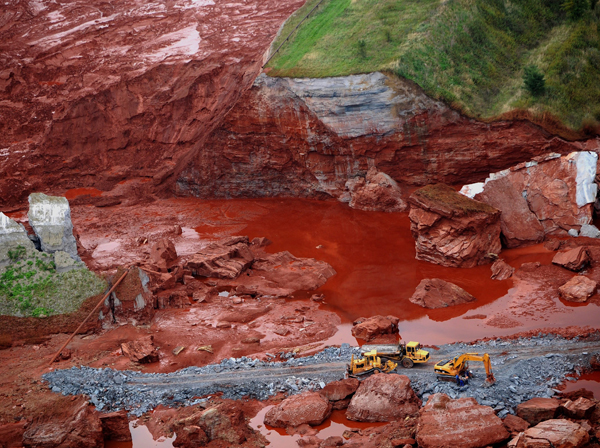 Hungary's river of skin-burning red sludge reaches Danube