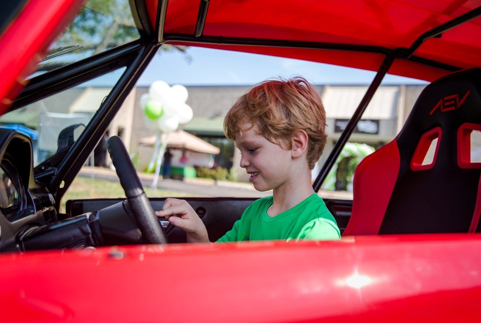 Battery-powered cars take the spotlight at electric vehicle show
