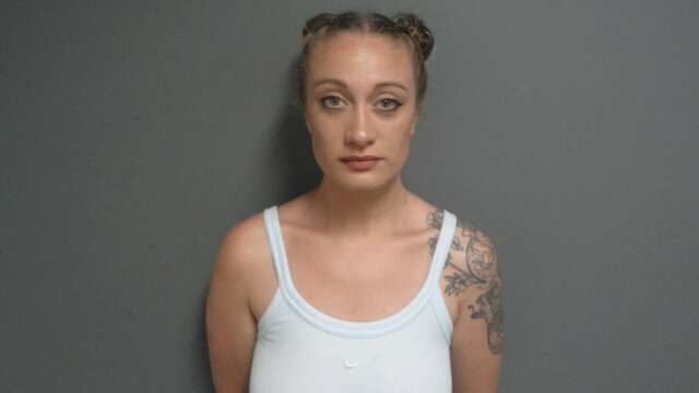 Harwinton woman charged with threatening after house fire, police say