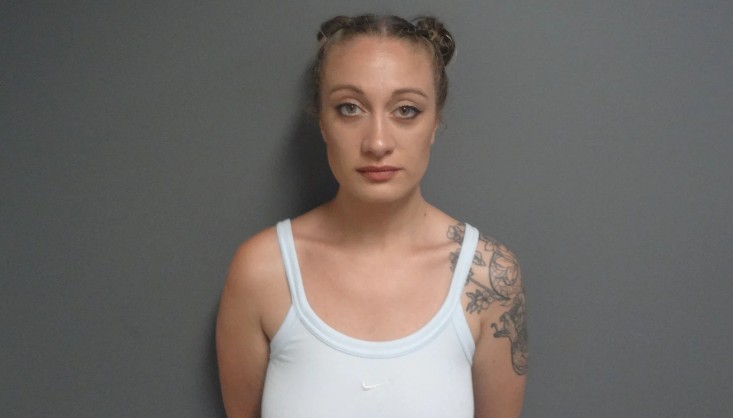 Harwinton woman charged with threatening after house fire, police say