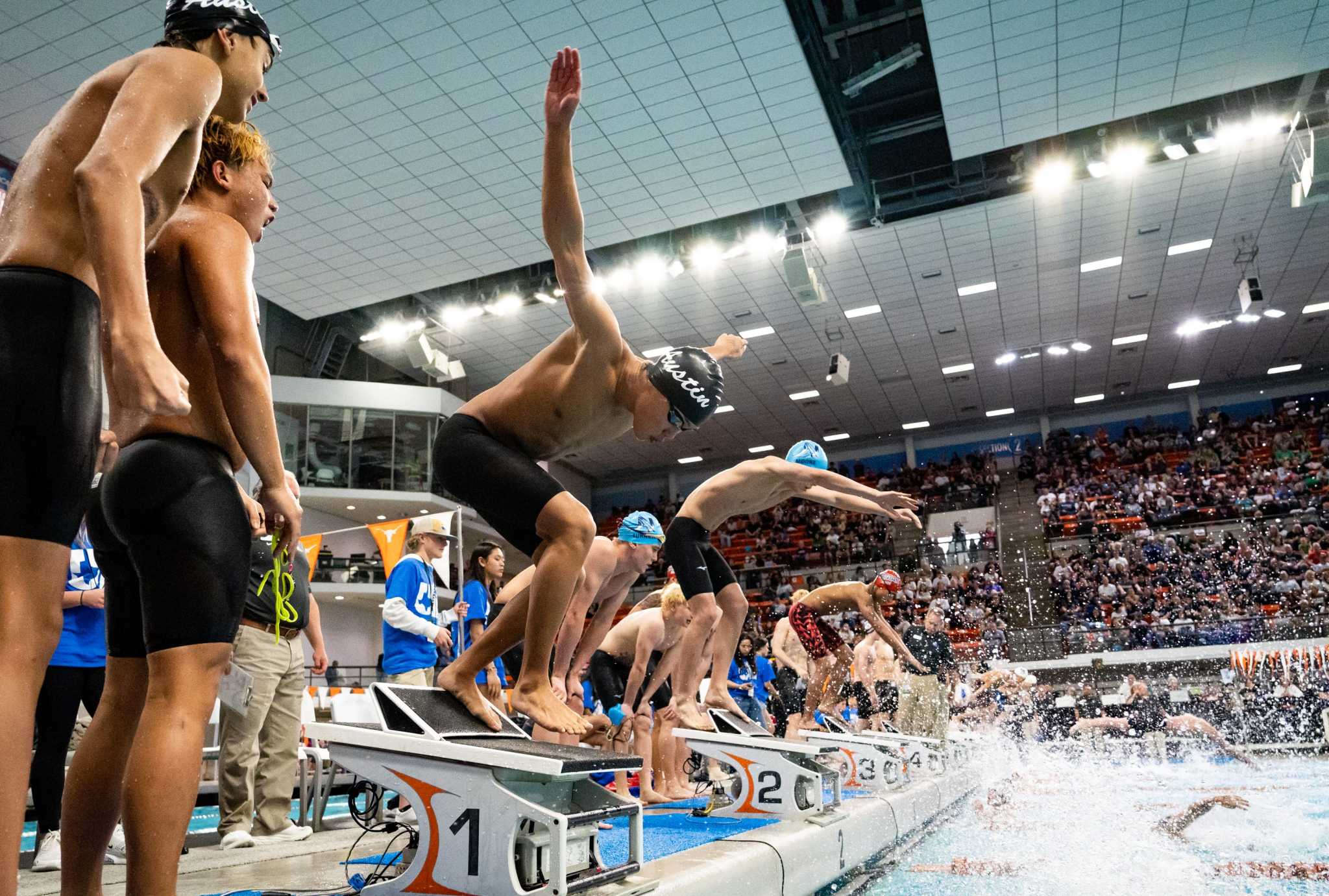 Athletes compete in Texas UIL State Swimming and Diving Championships