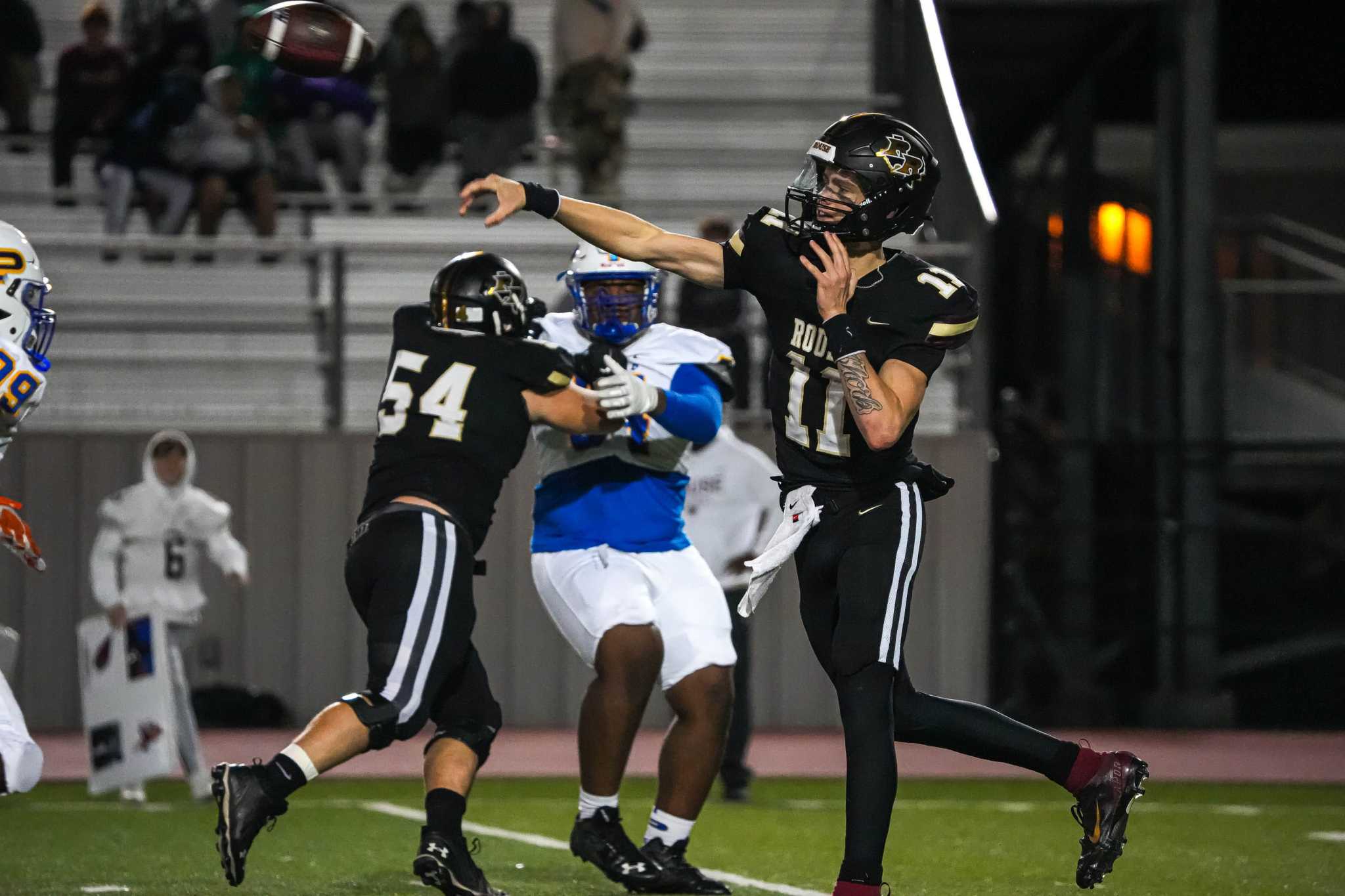 Rouse football flashes familiar form while clinching playoff spot