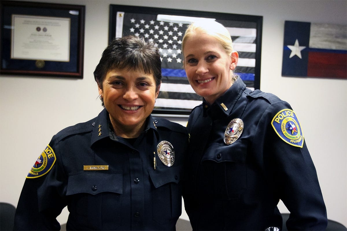 Police chief appoints first female commander, first black lieutenant