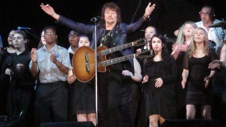 Former Journey frontman Steve Perry appears on stage