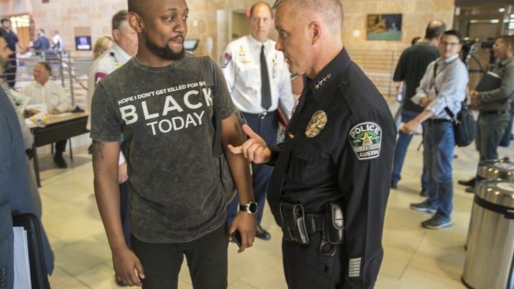 Well-known Austin activist Chas Moore charged with assault