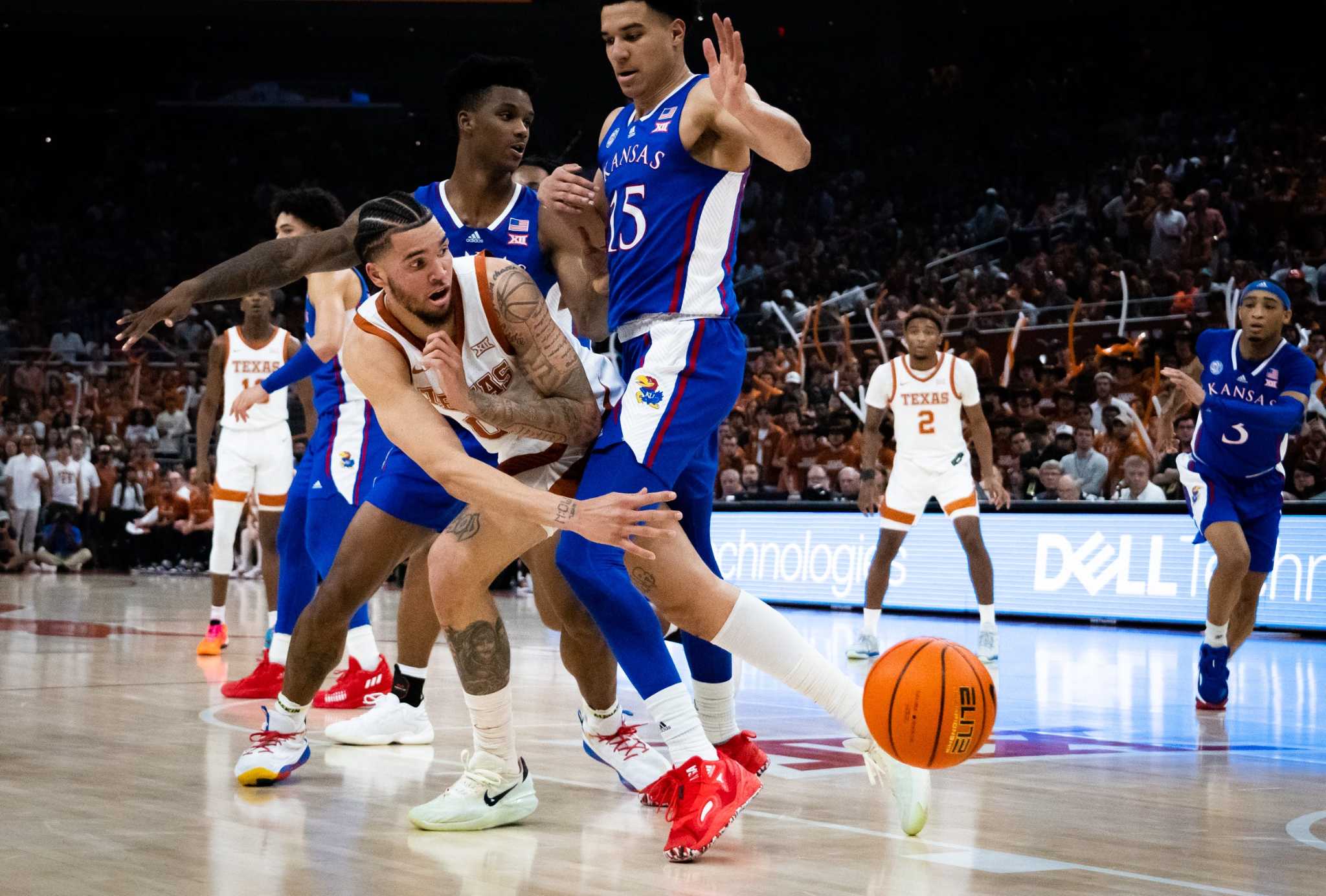 Win over Kansas gives Texas men momentum to end regular season