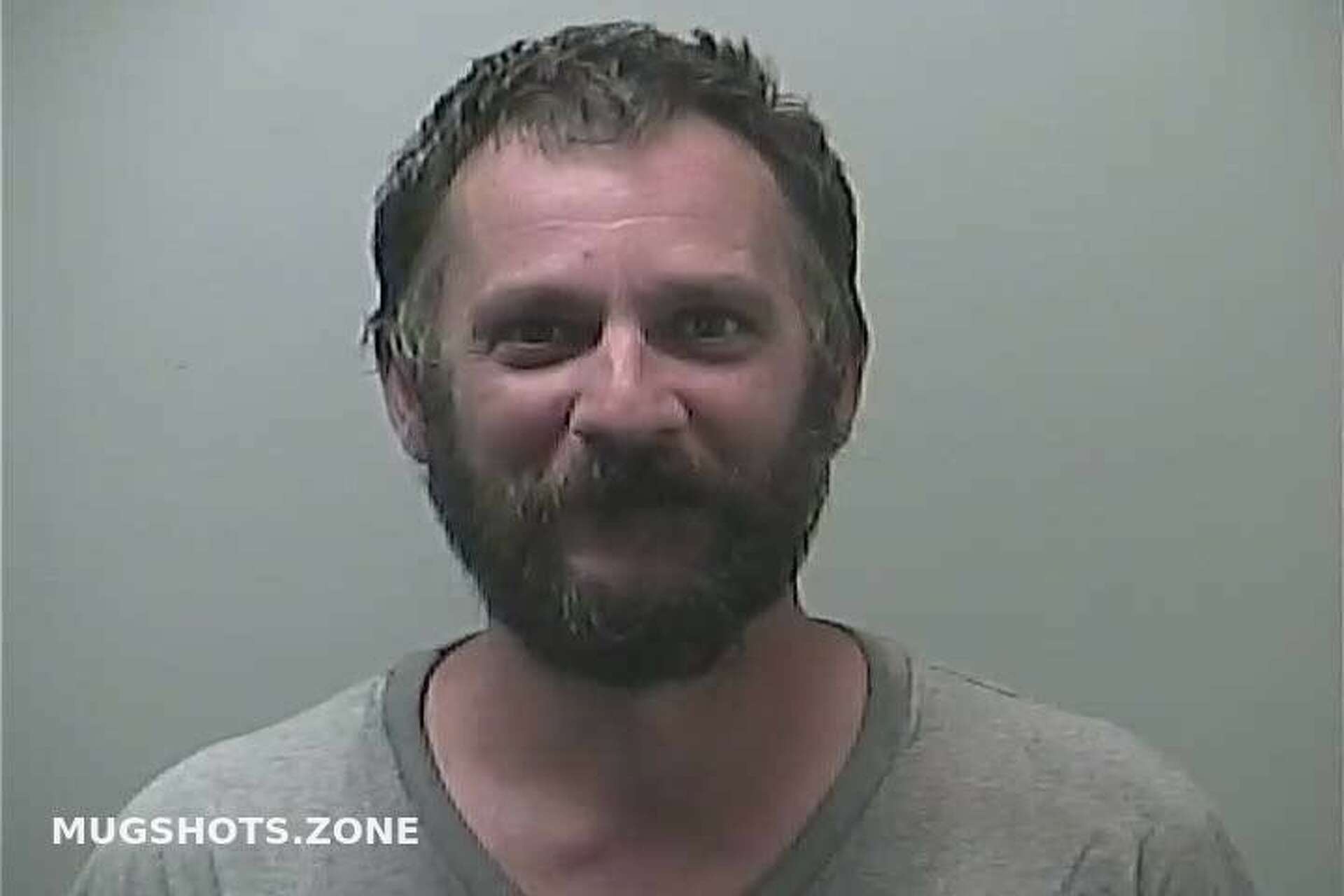 Timothy Hand accused of assaulting neighboring man