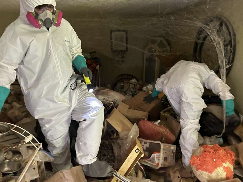 CT house where body found had debris piled high, photos, videos show