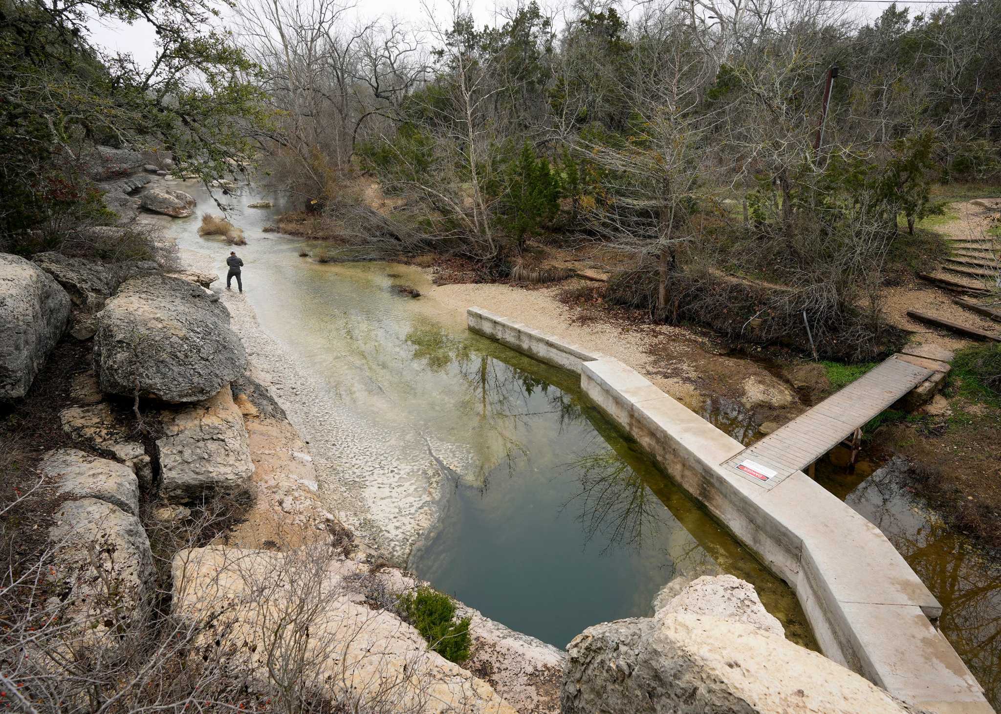 Jacob's Well refilled by Texas rains. See before and after photos