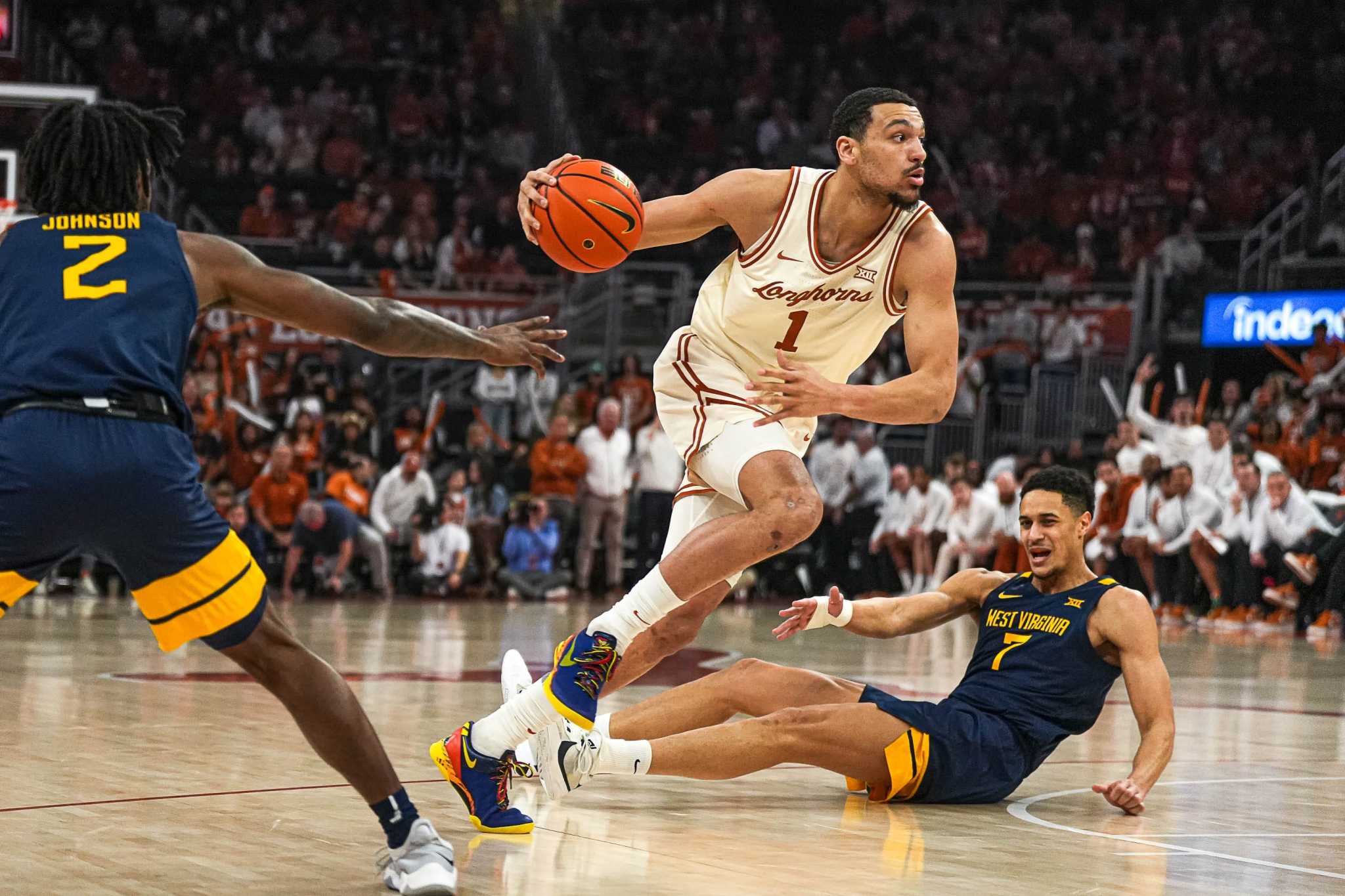 Dylan Disu, Texas basketball race past West Virginia for Big 12 win
