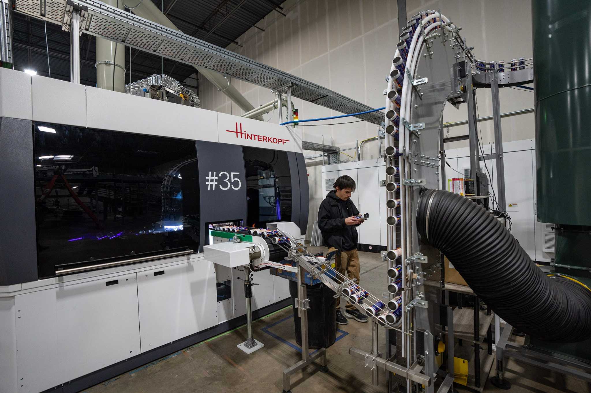 See how it's made: Canworks prints artwork on aluminum cans
