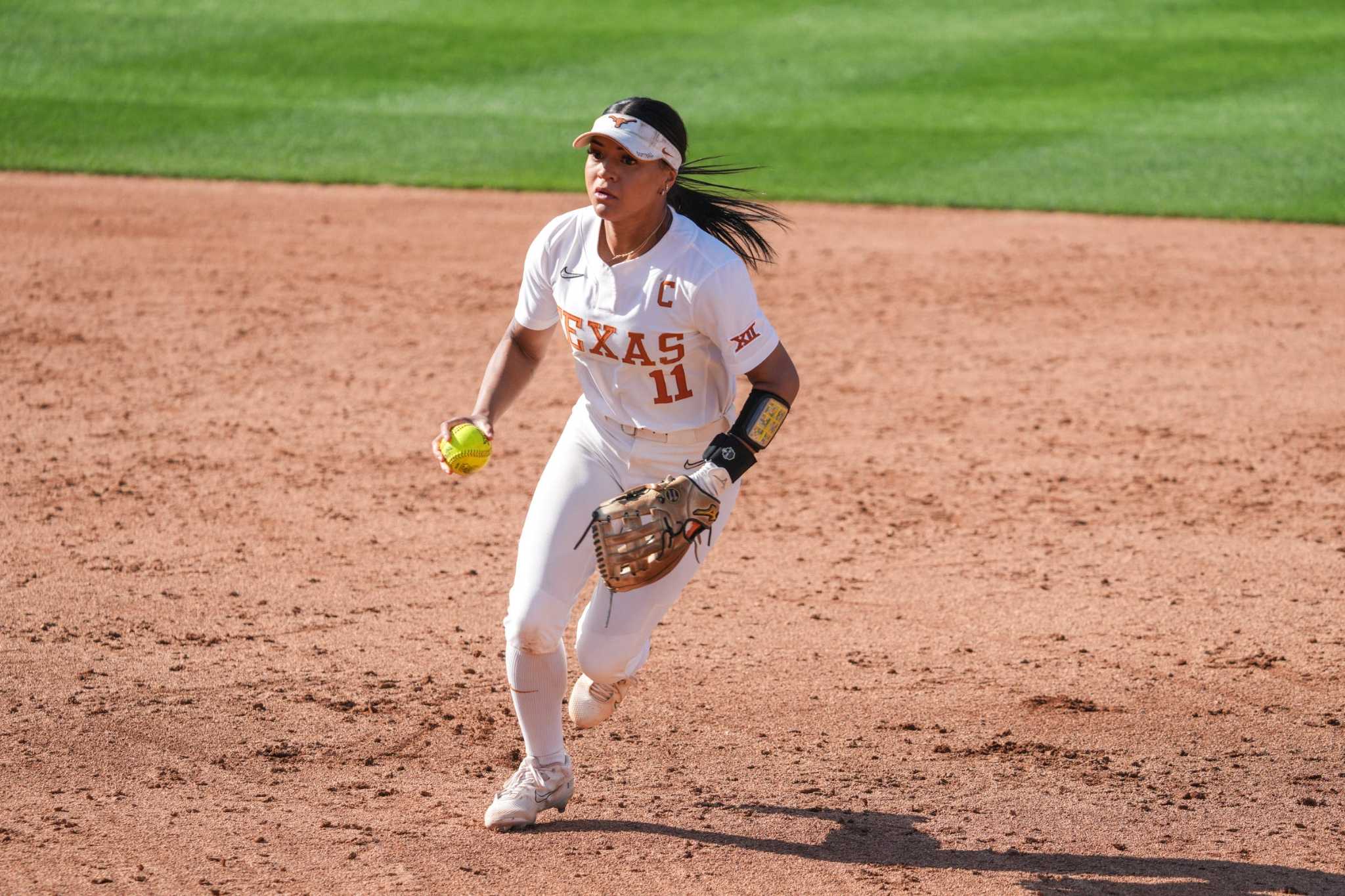 Texas Longhorns power past Northwestern in NCAA softball tournament