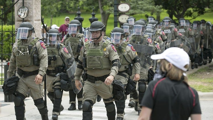 Photos: Hundreds protest and counter-protest Islamic Sharia law at ...