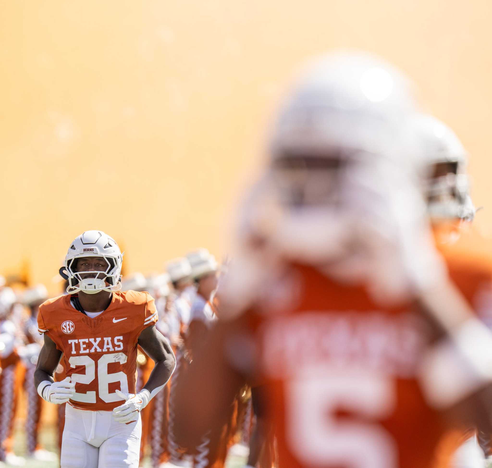 Texas' Quintrevion Wisner shines in run game after fumbles send starter ...
