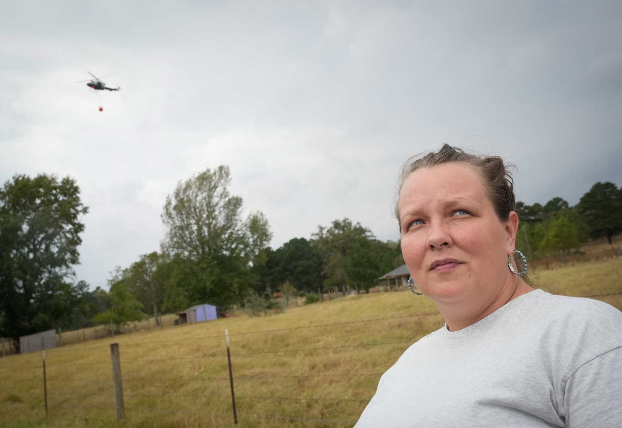Hudson Fire in Bastrop grows, firefighters battle blaze. See photos.