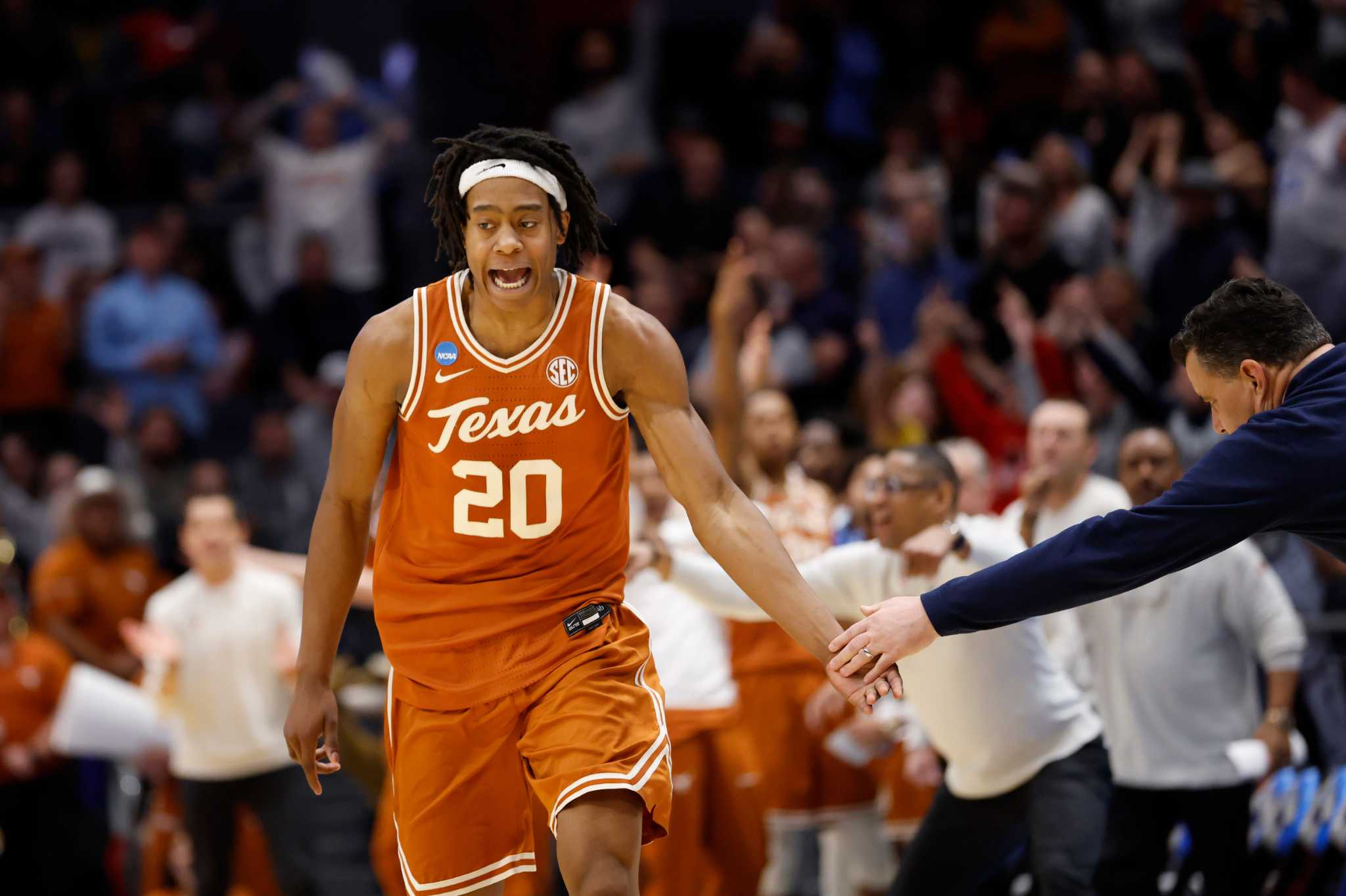 New Texas coach Sean Miller encourages Tre Johnson to go pro