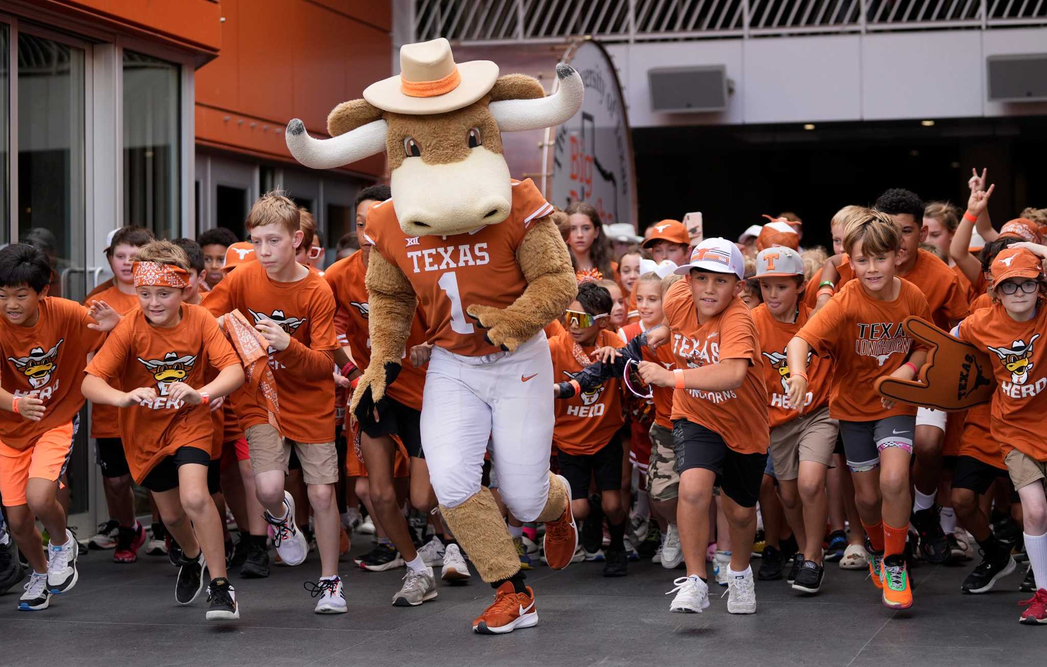 Fans arrive to see the Texas Longhorns football team take on BYU